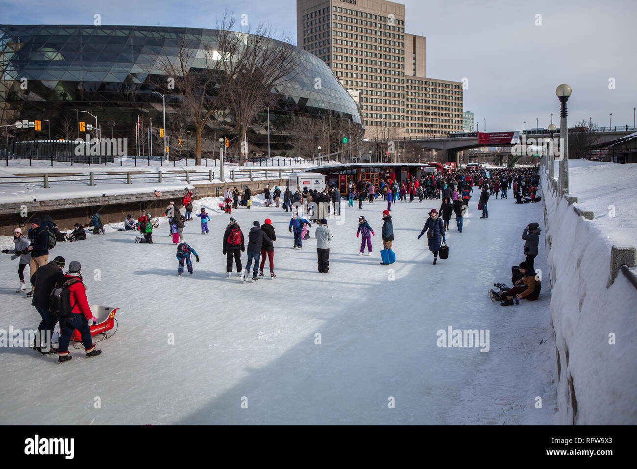 People celebrate the Winterlude festival on the frozen Rideau Canal ...