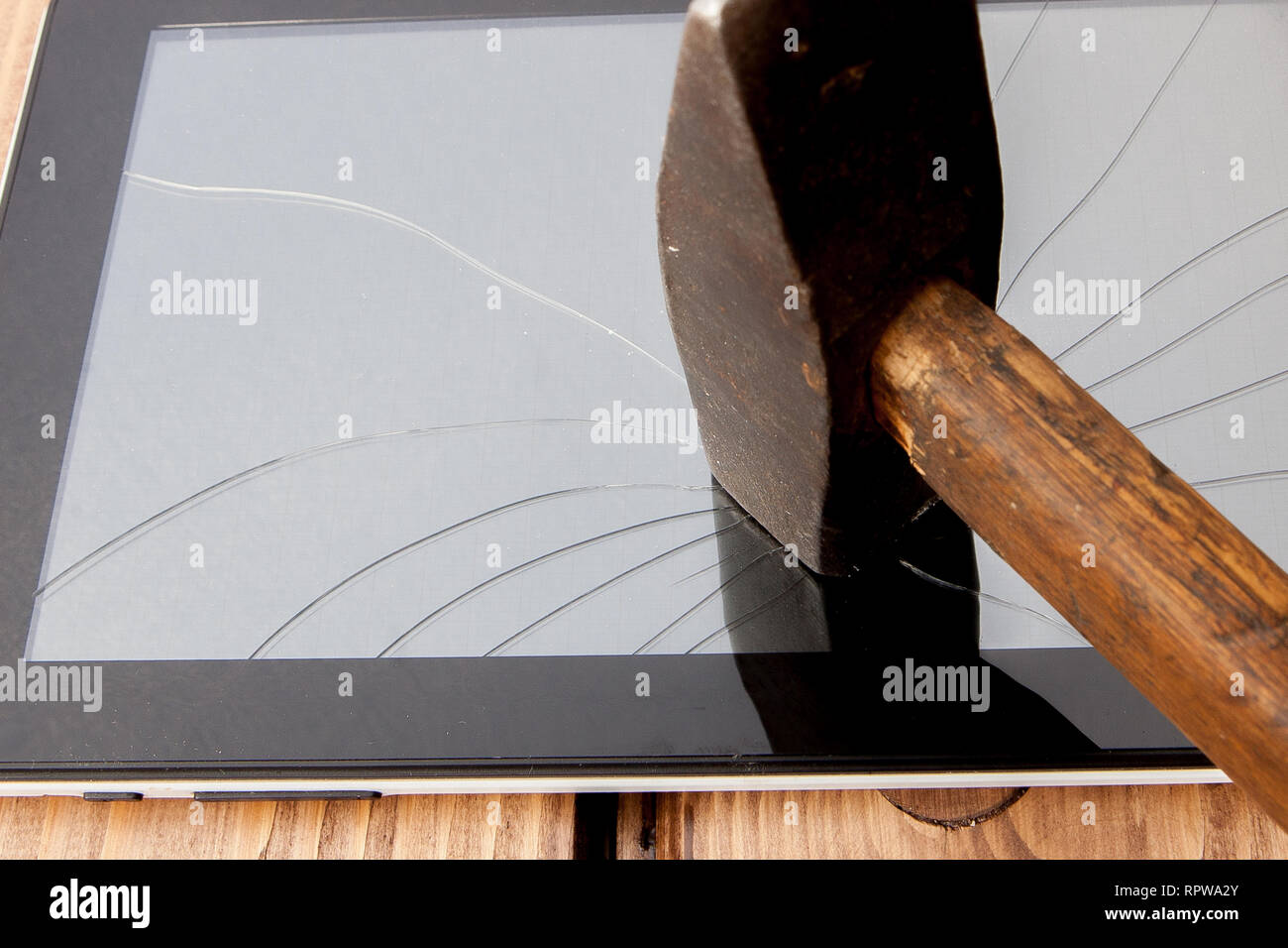 Smashed Screen Vandalised Broken Glass Close Up With Hammer Stock Photo ...