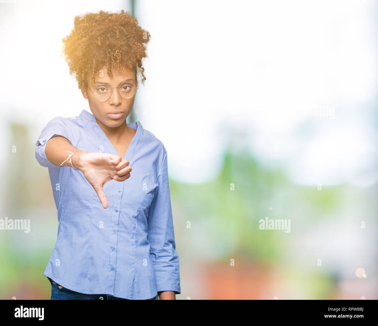 Beautiful young african american business woman over isolated ...