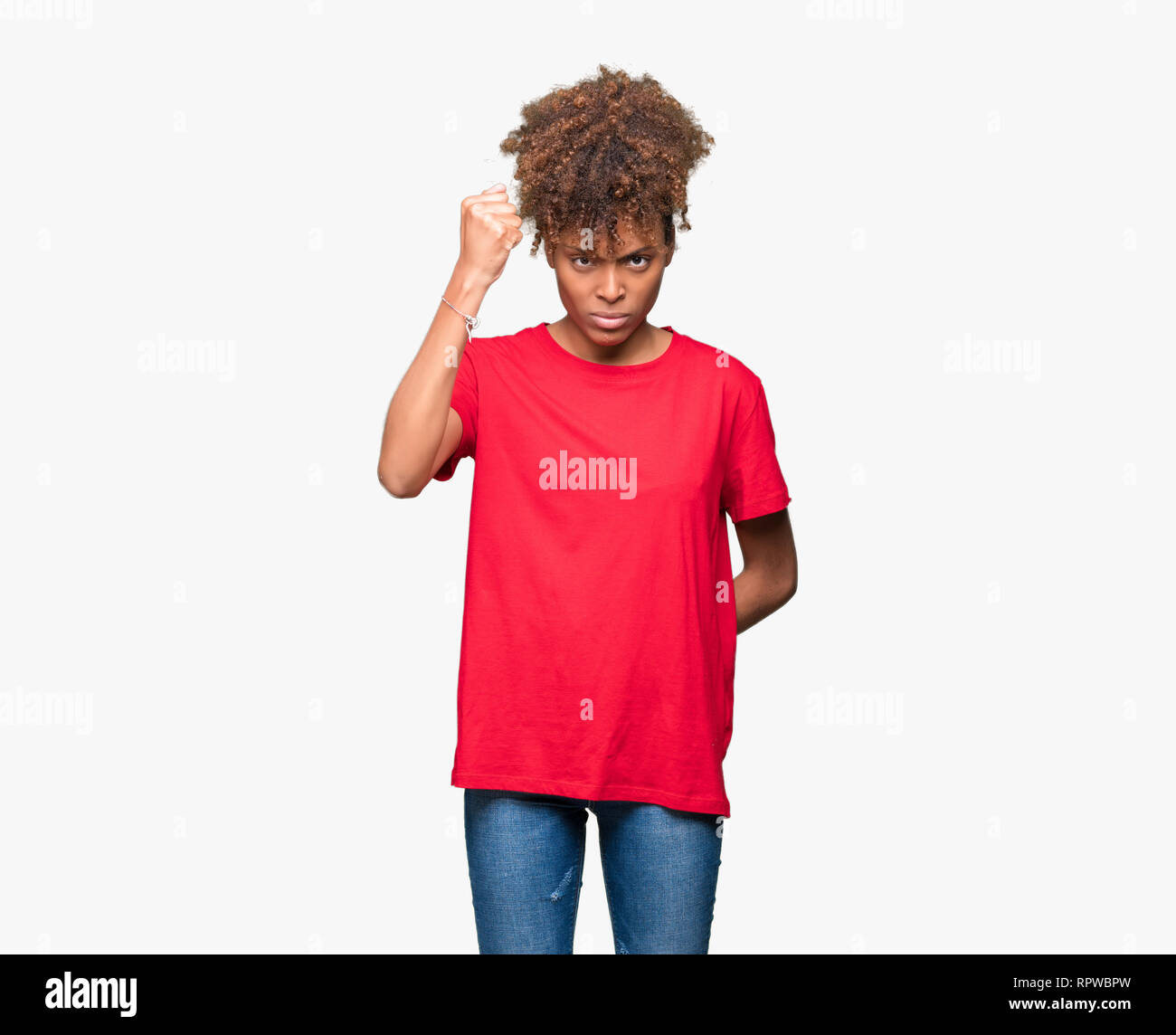 Angry young woman raising hand Cut Out Stock Images & Pictures - Alamy