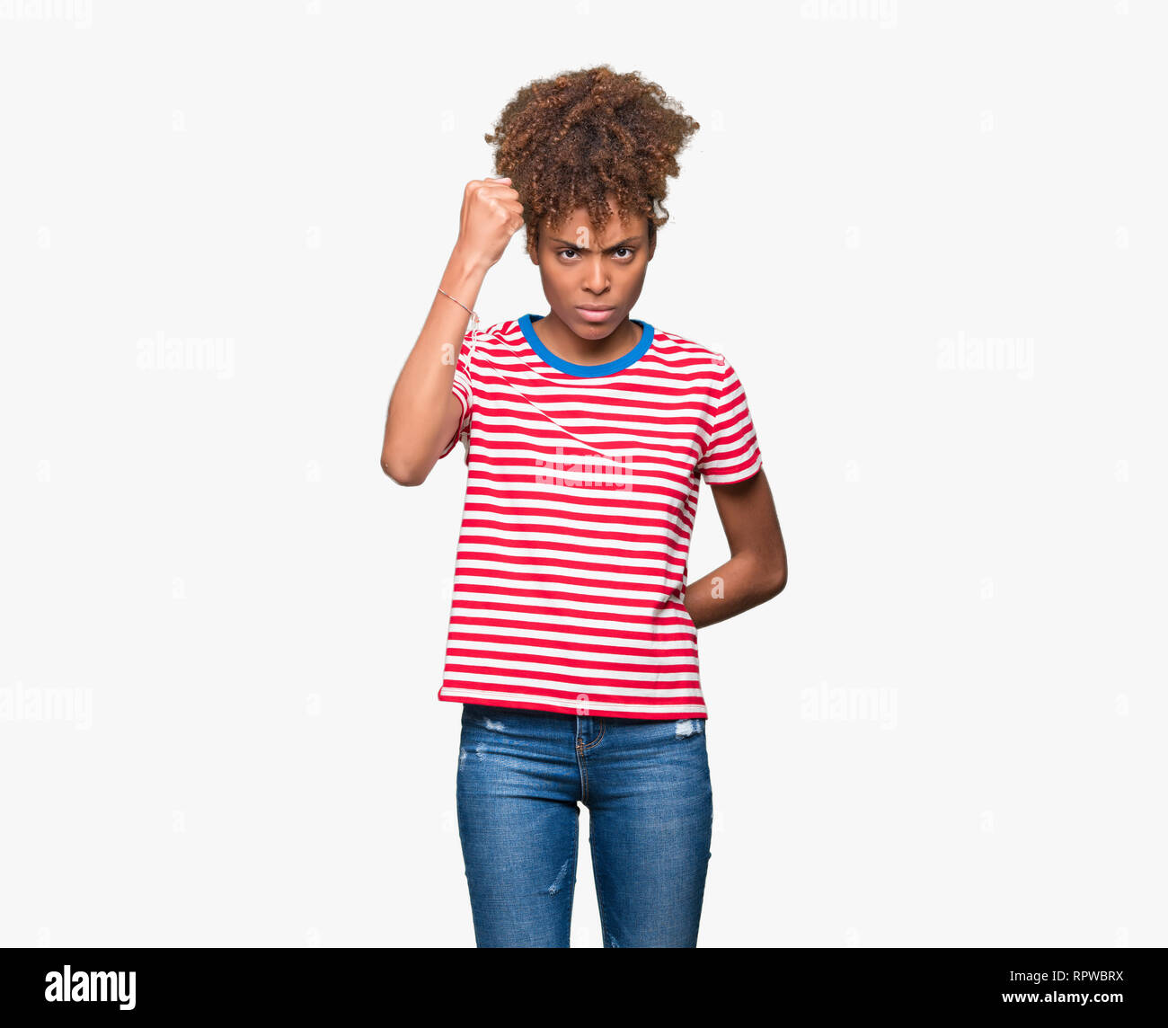 Beautiful young african american woman over isolated background angry ...