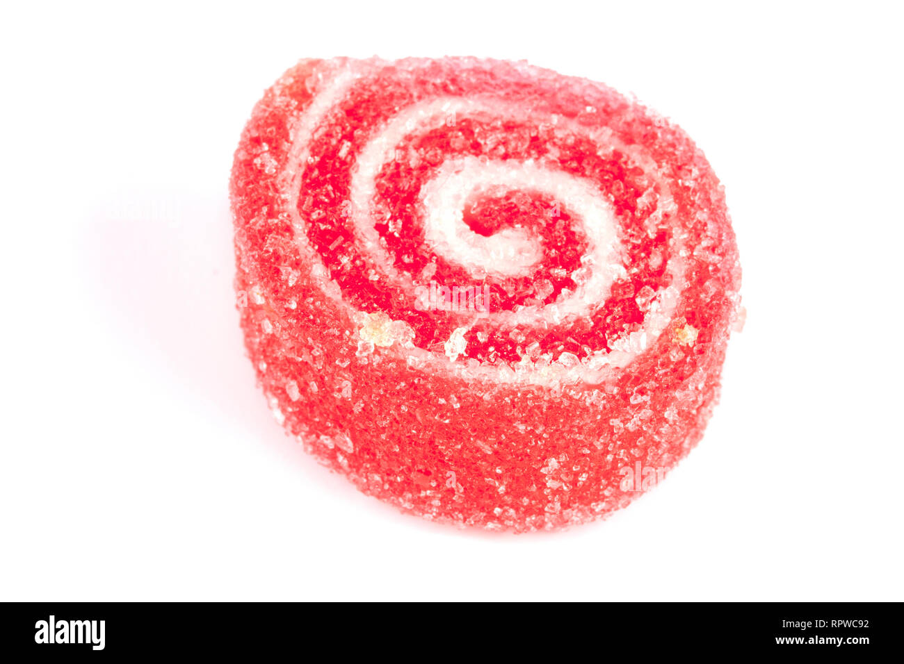 one red twisted jelly isolated on white background Stock Photo - Alamy