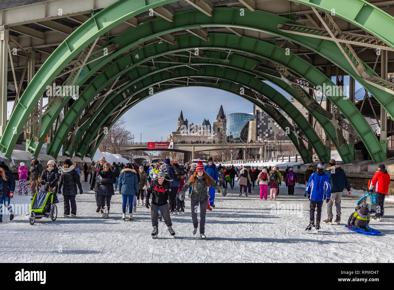 People celebrate the Winterlude festival on the frozen Rideau Canal ...