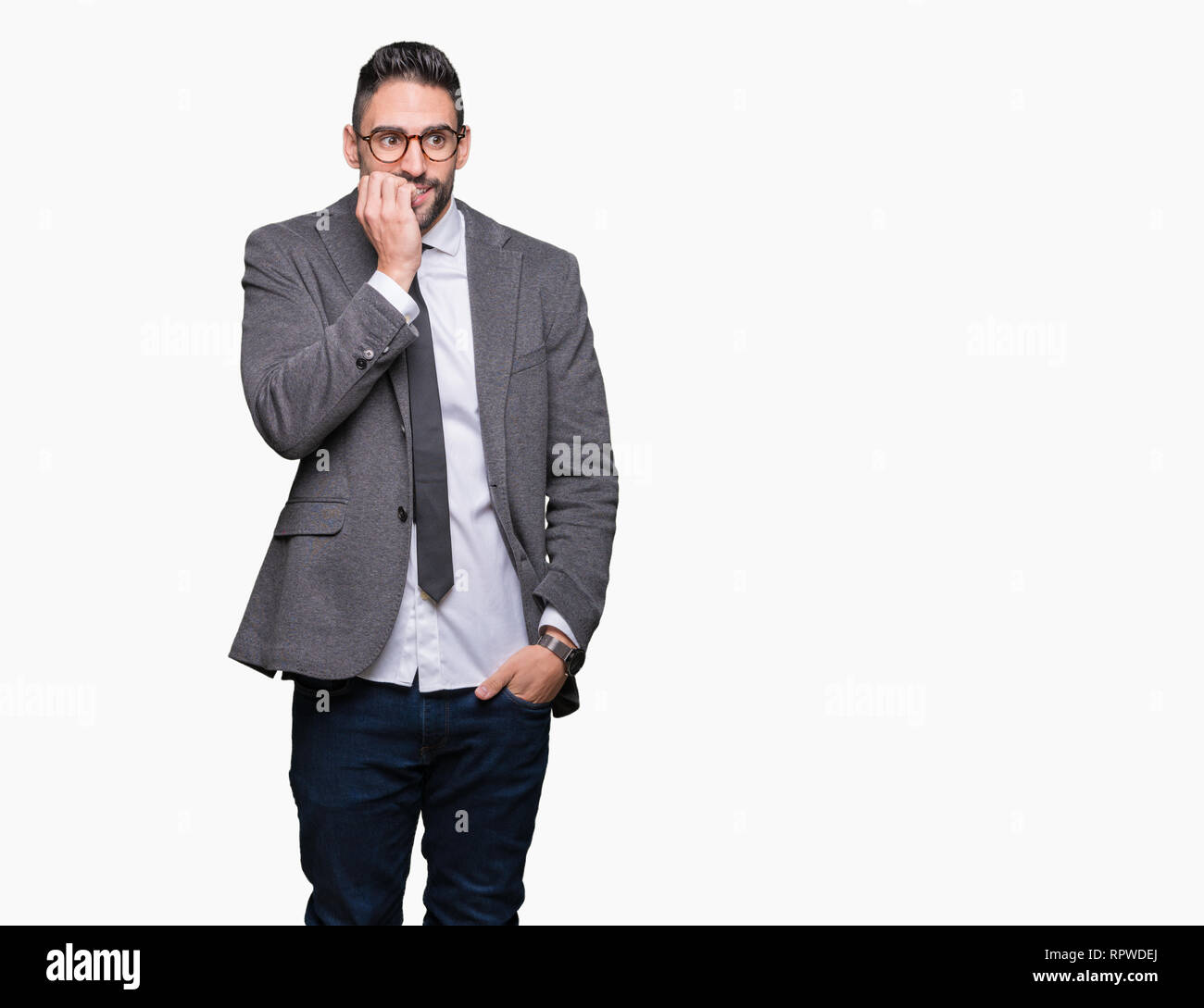 Young handsome business man over isolated background looking stressed ...