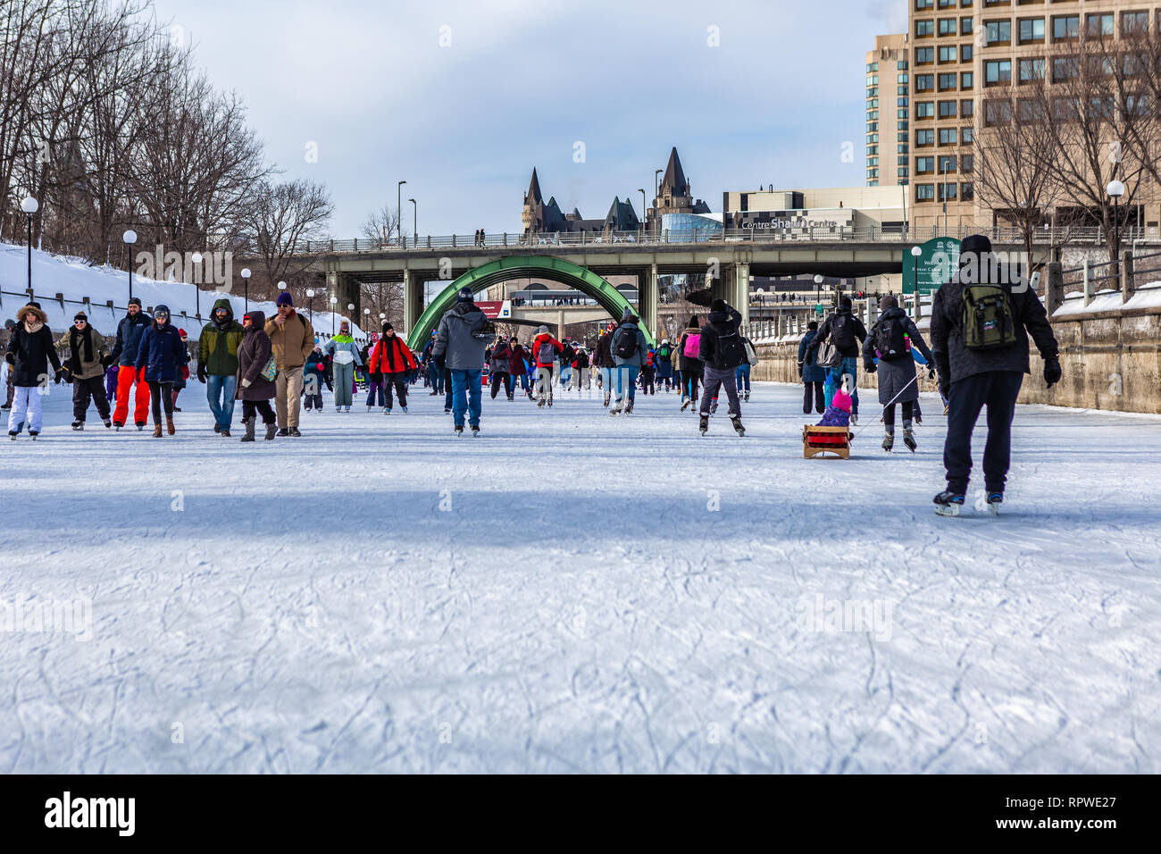 People celebrate the Winterlude festival on the frozen Rideau Canal ...