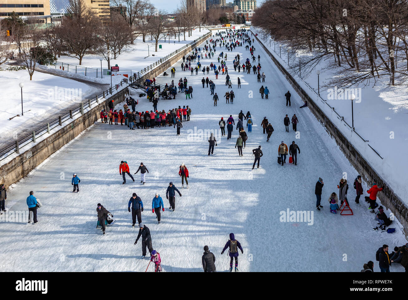 People celebrate the Winterlude festival on the frozen Rideau Canal ...