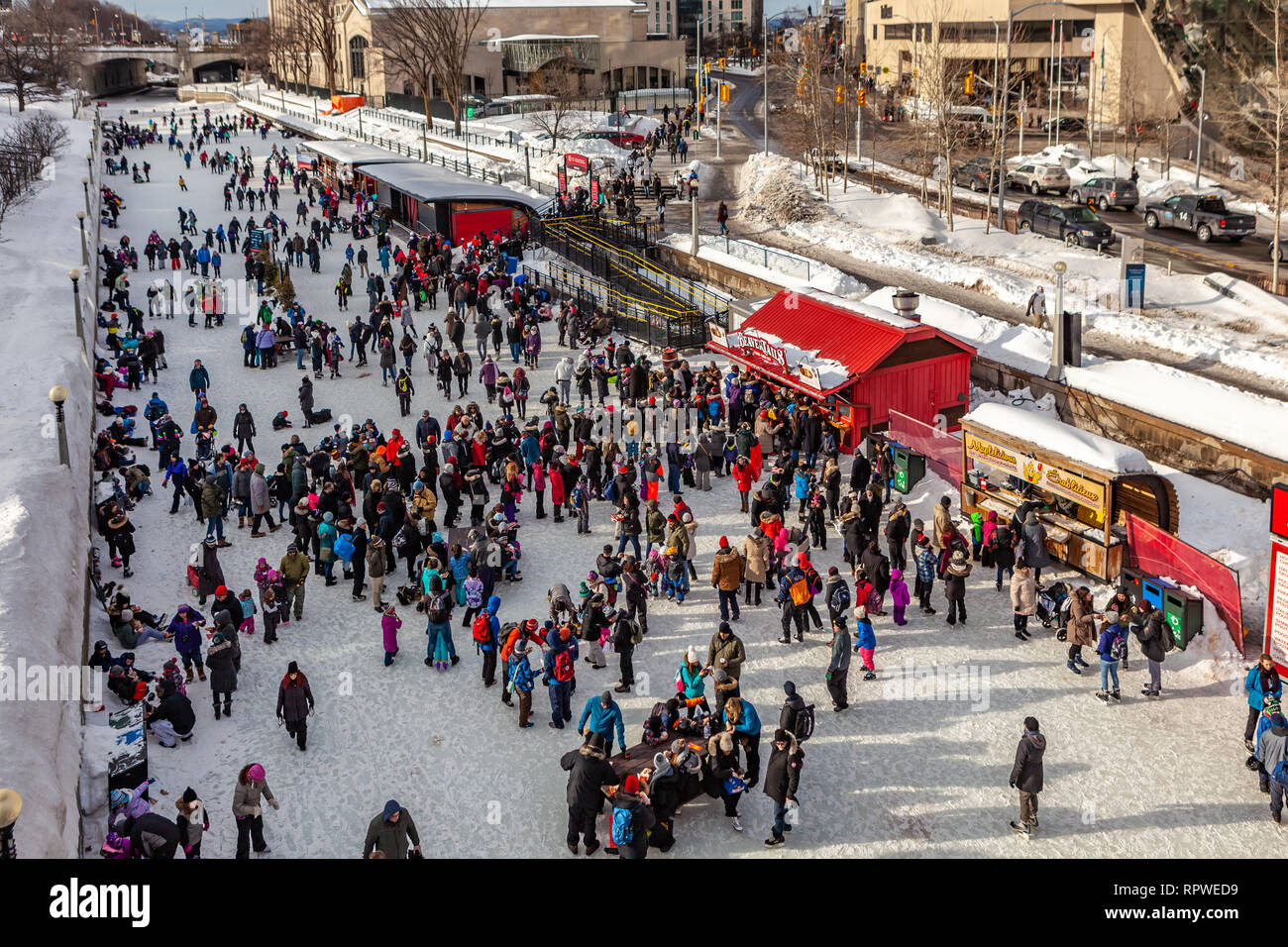 People celebrate the Winterlude festival on the frozen Rideau Canal ...