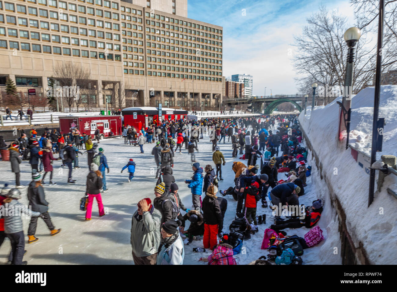 People celebrate the Winterlude festival on the frozen Rideau Canal ...