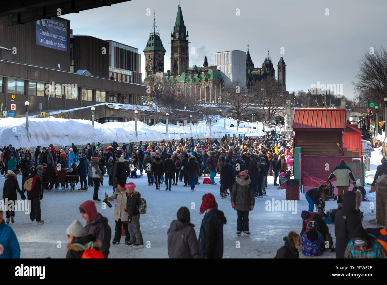People celebrate the Winterlude festival on the frozen Rideau Canal ...