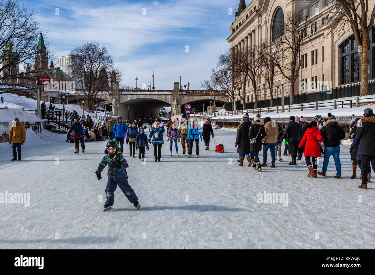 People celebrate the Winterlude festival on the frozen Rideau Canal ...