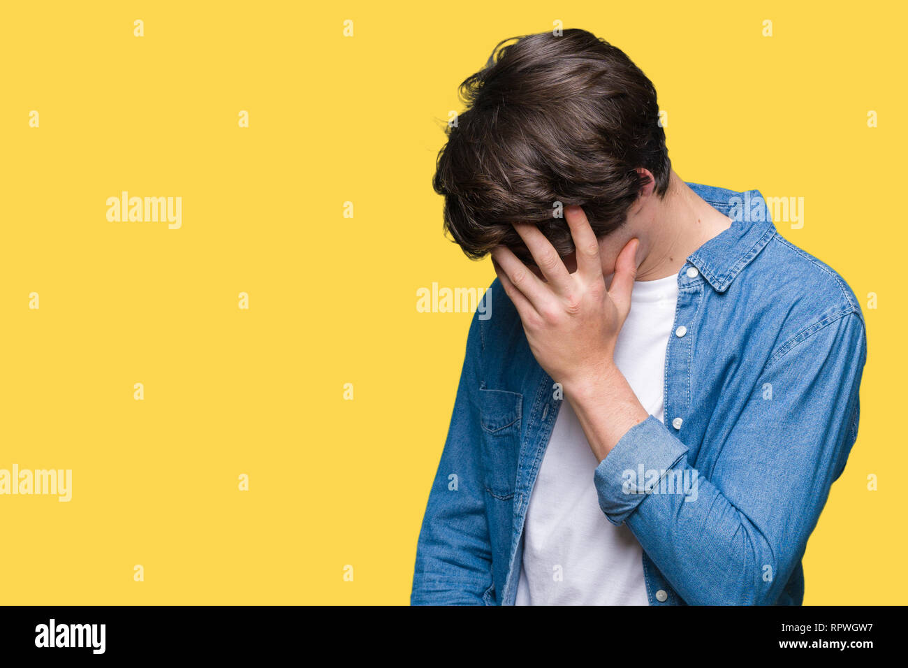 Young handsome man wearing glasses over isolated background with sad ...