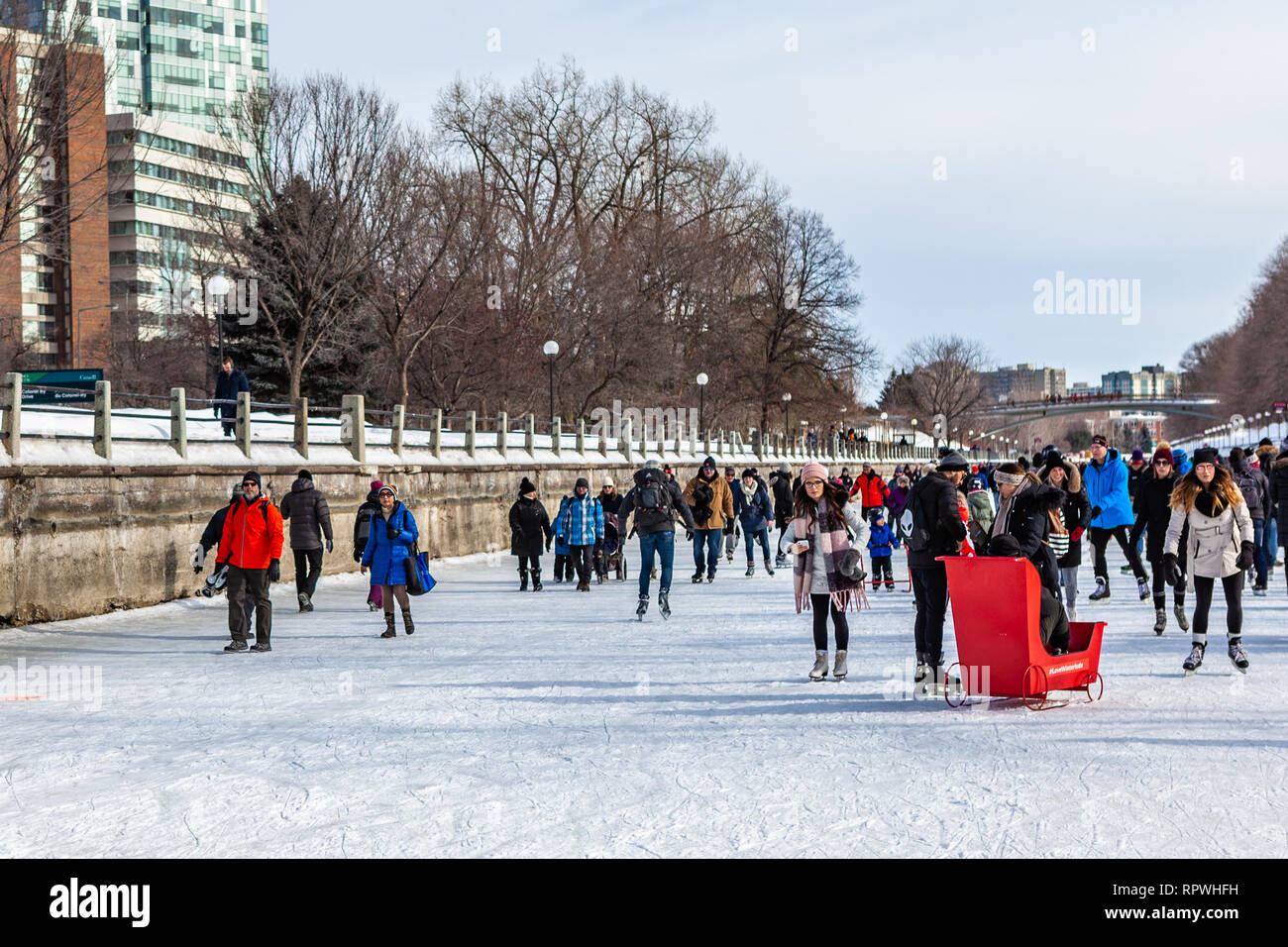 People celebrate the Winterlude festival on the frozen Rideau Canal ...
