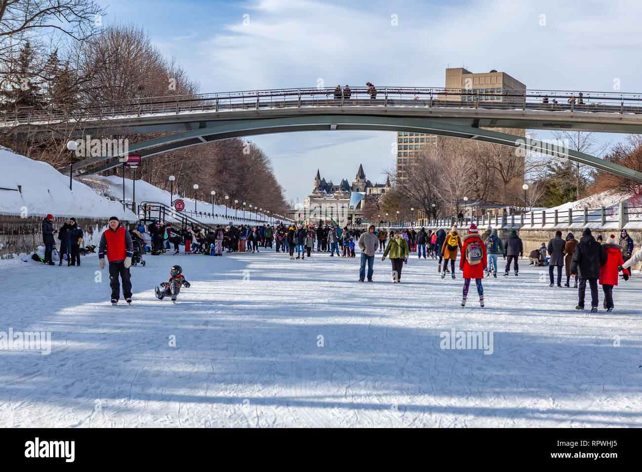 People celebrate the Winterlude festival on the frozen Rideau Canal ...