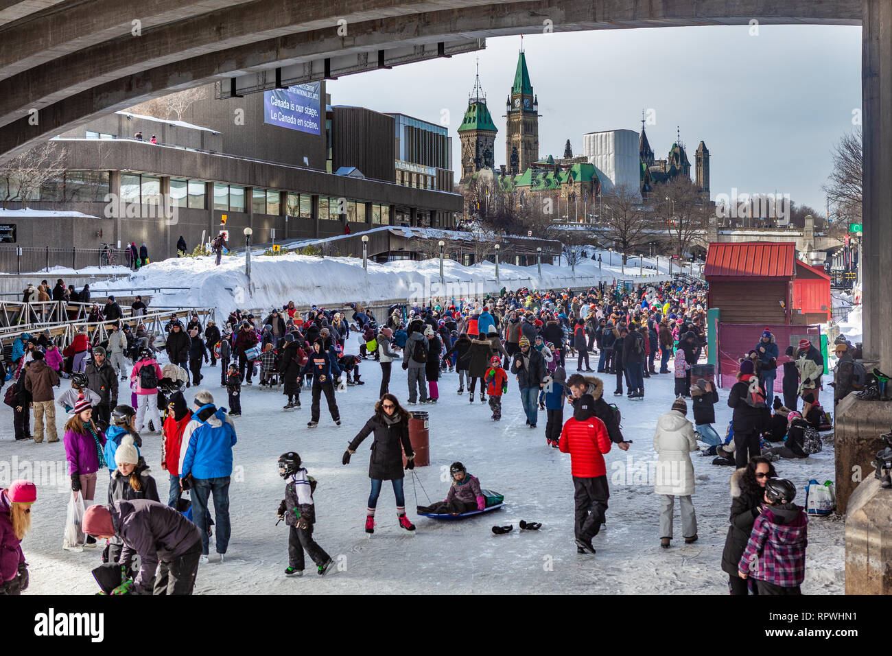 People celebrate the Winterlude festival on the frozen Rideau Canal ...