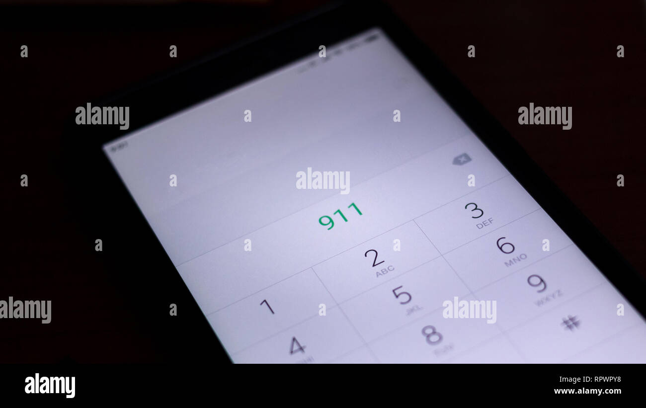 Dialing 911 hi-res stock photography and images - Alamy