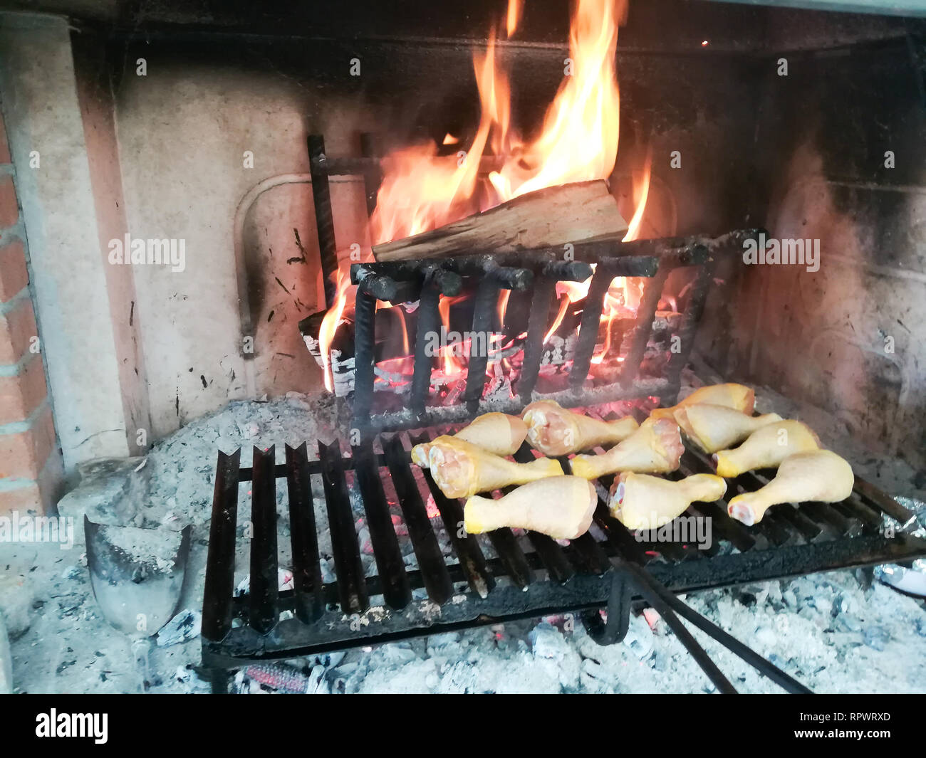 Grilled meat cooked on fireplace Stock Photo - Alamy