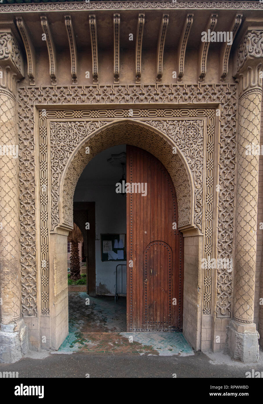 Traditional Moroccan style design of an ancient wooden entry riad door ...