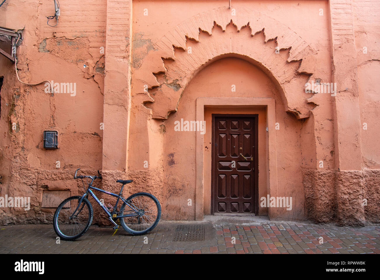 Traditional Moroccan style design of an ancient wooden entry riad door ...