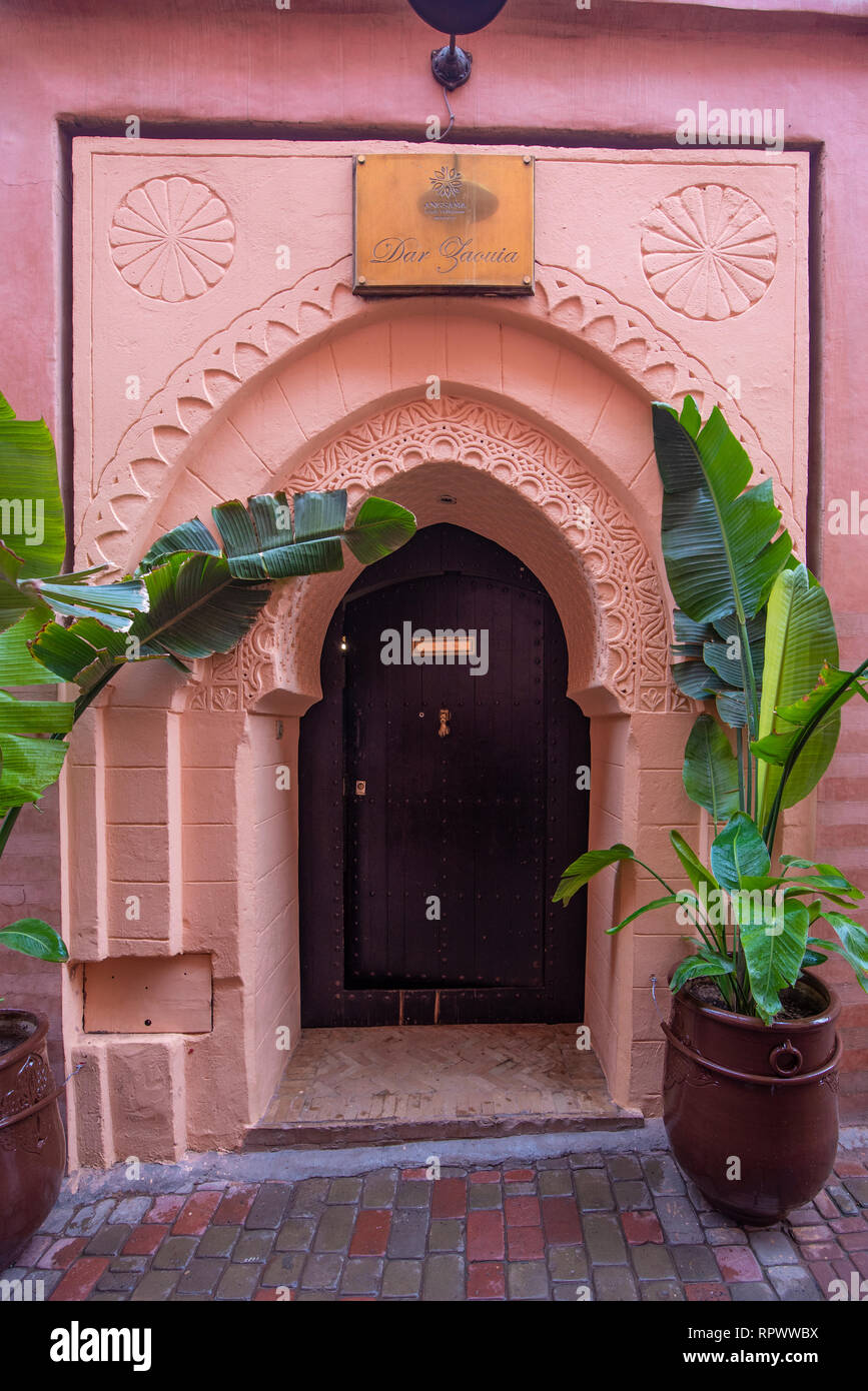 Traditional Moroccan style design of an ancient wooden entry riad door ...