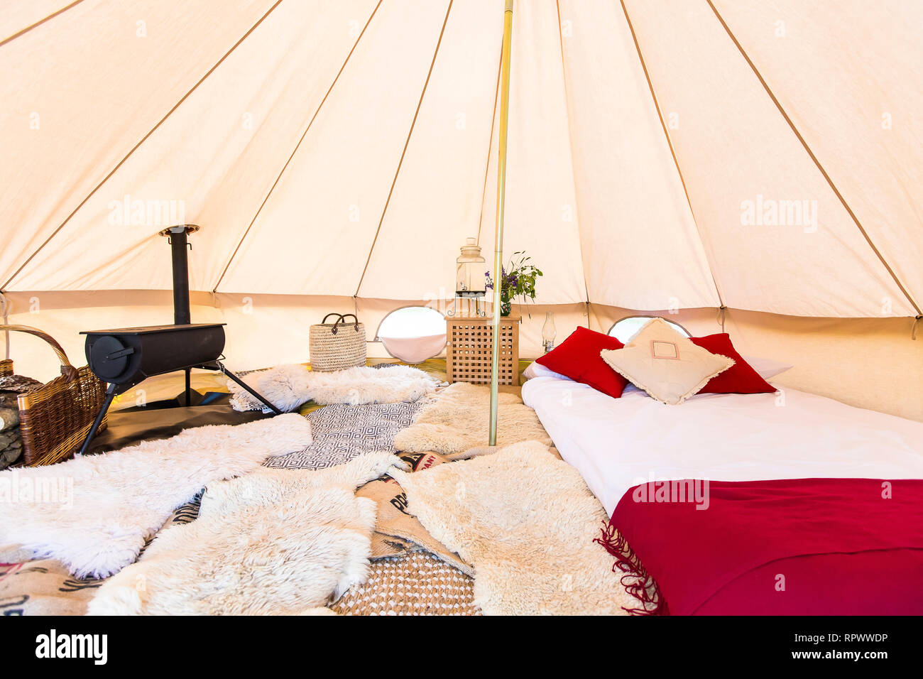 Luxury glamping bell tent interior, Kent, UK Stock Photo - Alamy