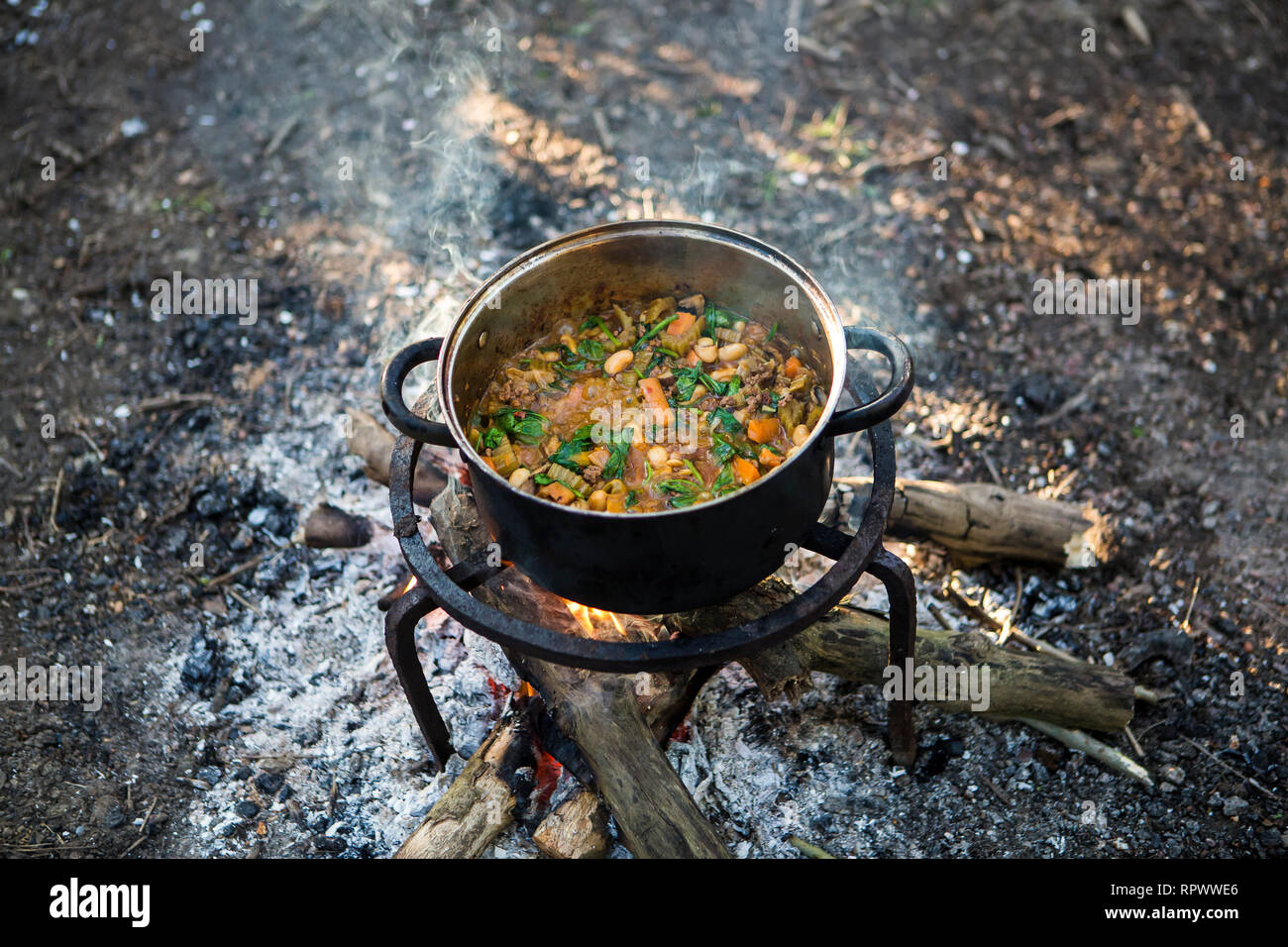 Cooking over a campfire in a woodland in Kent, UK Stock Photo - Alamy