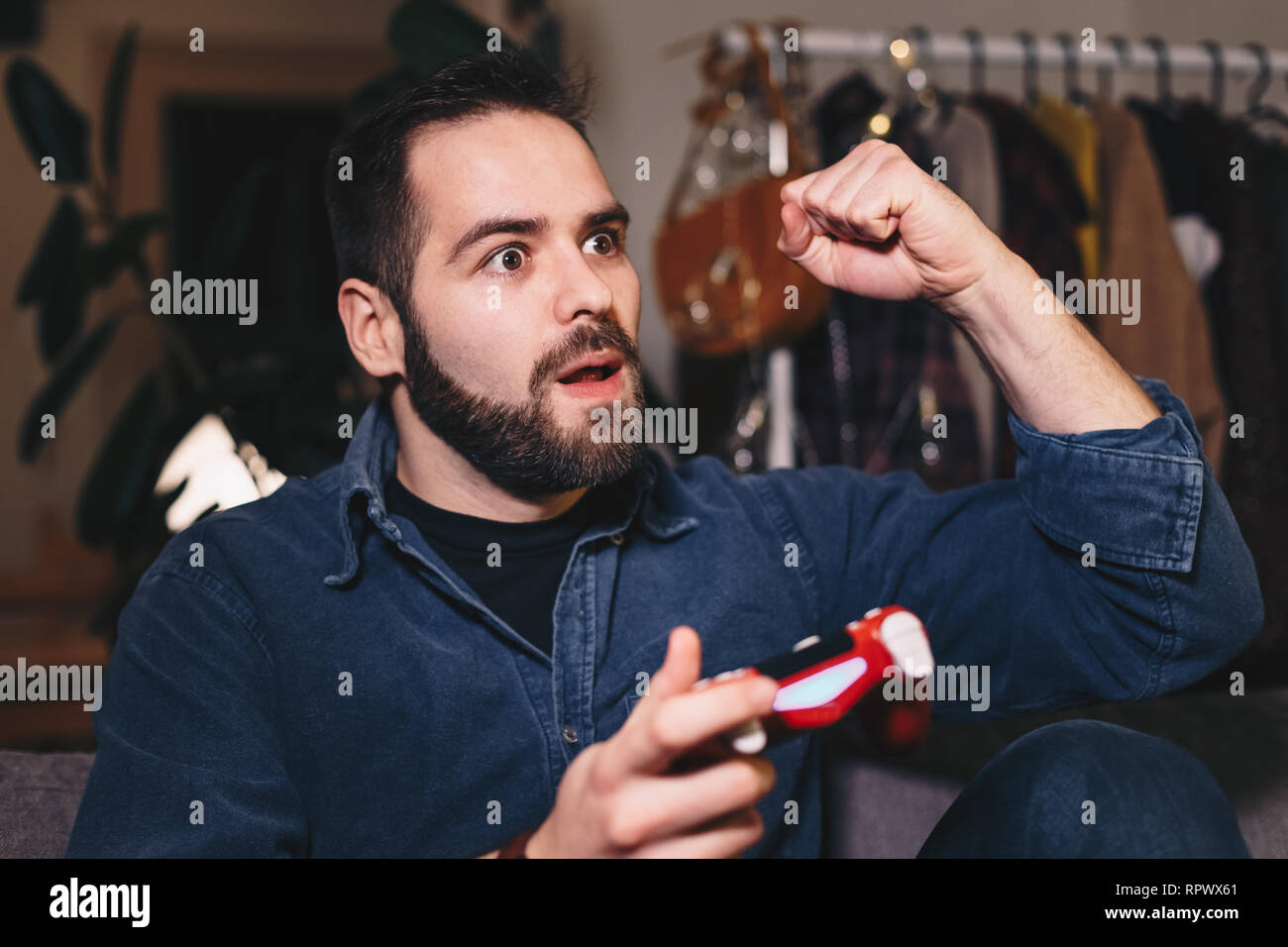 Addicted to gaming man tv hi-res stock photography and images - Alamy
