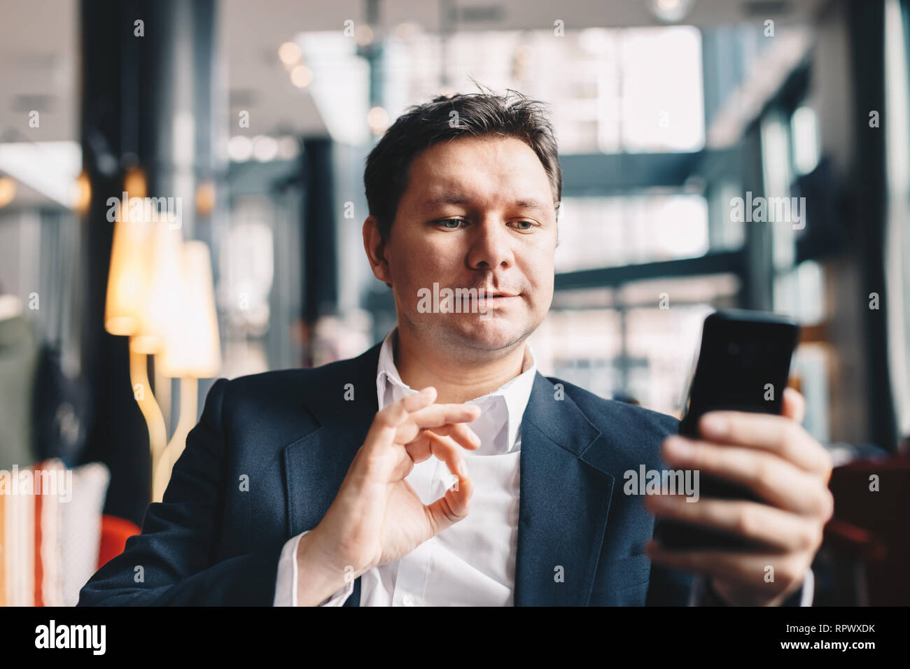 Young male stock market hi-res stock photography and images - Alamy