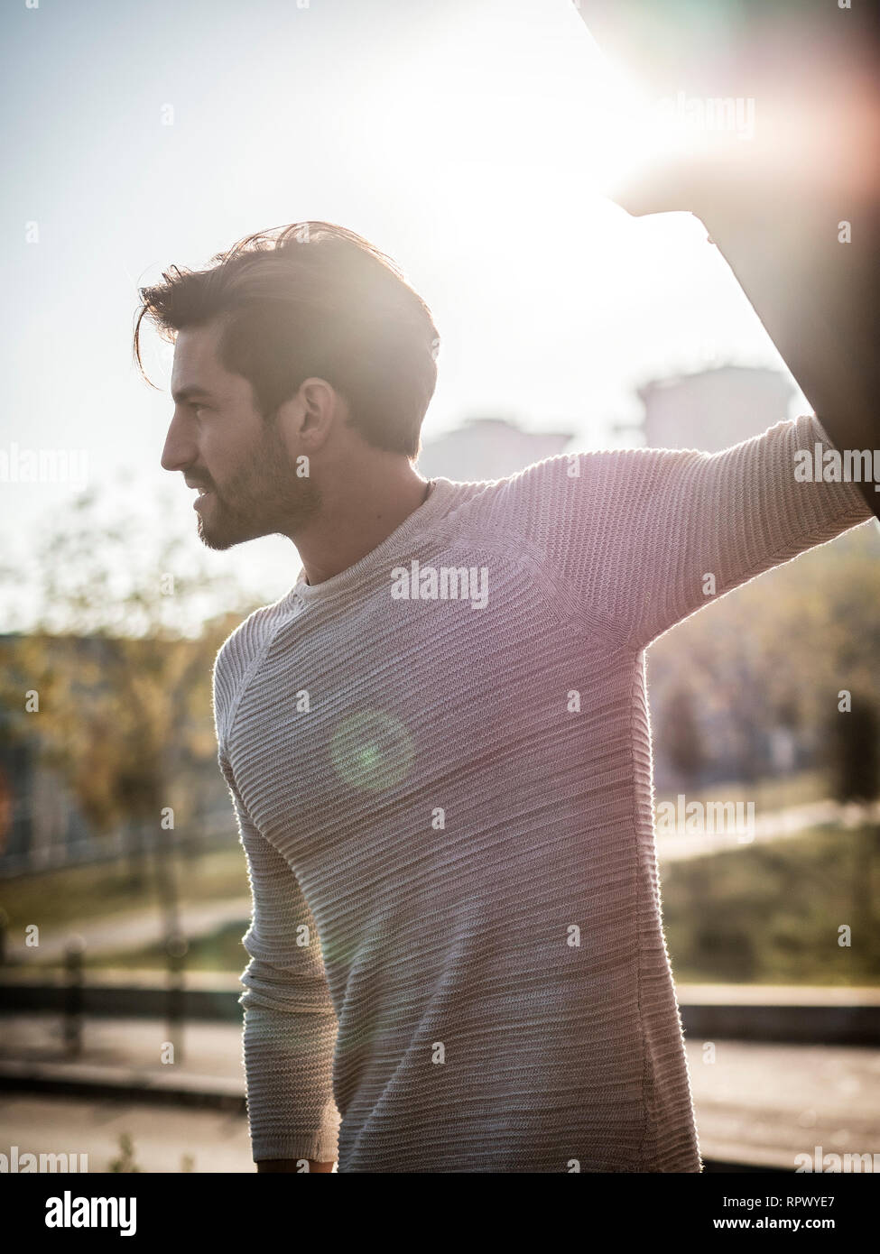 One handsome young man in city setting Stock Photo - Alamy
