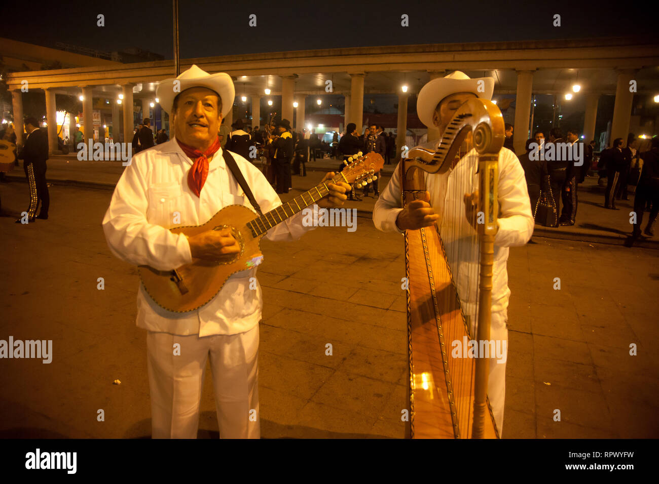 Mariachi musicians play mexican music at Garibaldi Square in Mexico ...