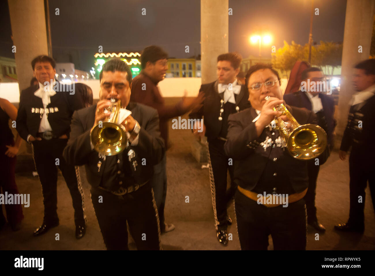 Mariachi musicians play mexican music at Garibaldi Square in Mexico ...