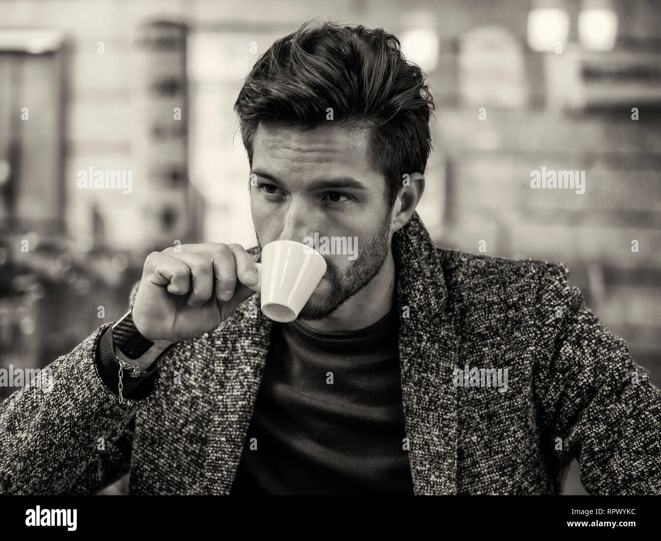 Handsome man drinking tea in hi-res stock photography and images - Alamy