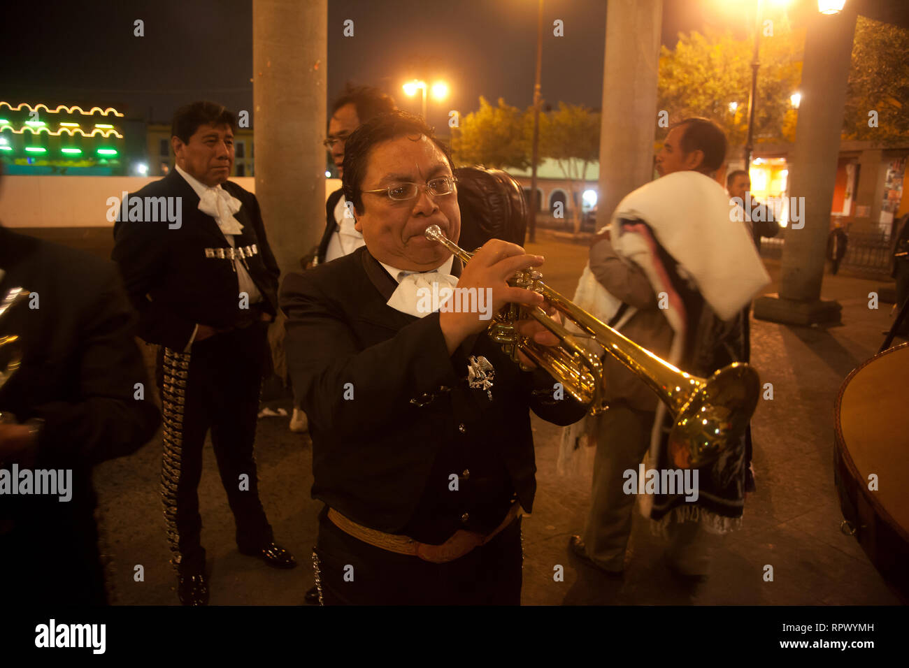 Mariachi musicians play mexican music at Garibaldi Square in Mexico ...