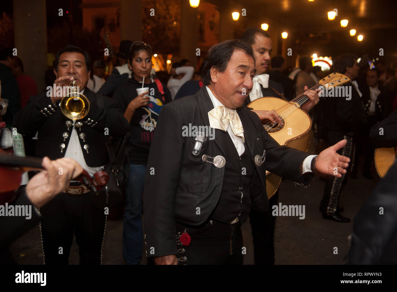 Mariachi musicians play mexican music at Garibaldi Square in Mexico ...