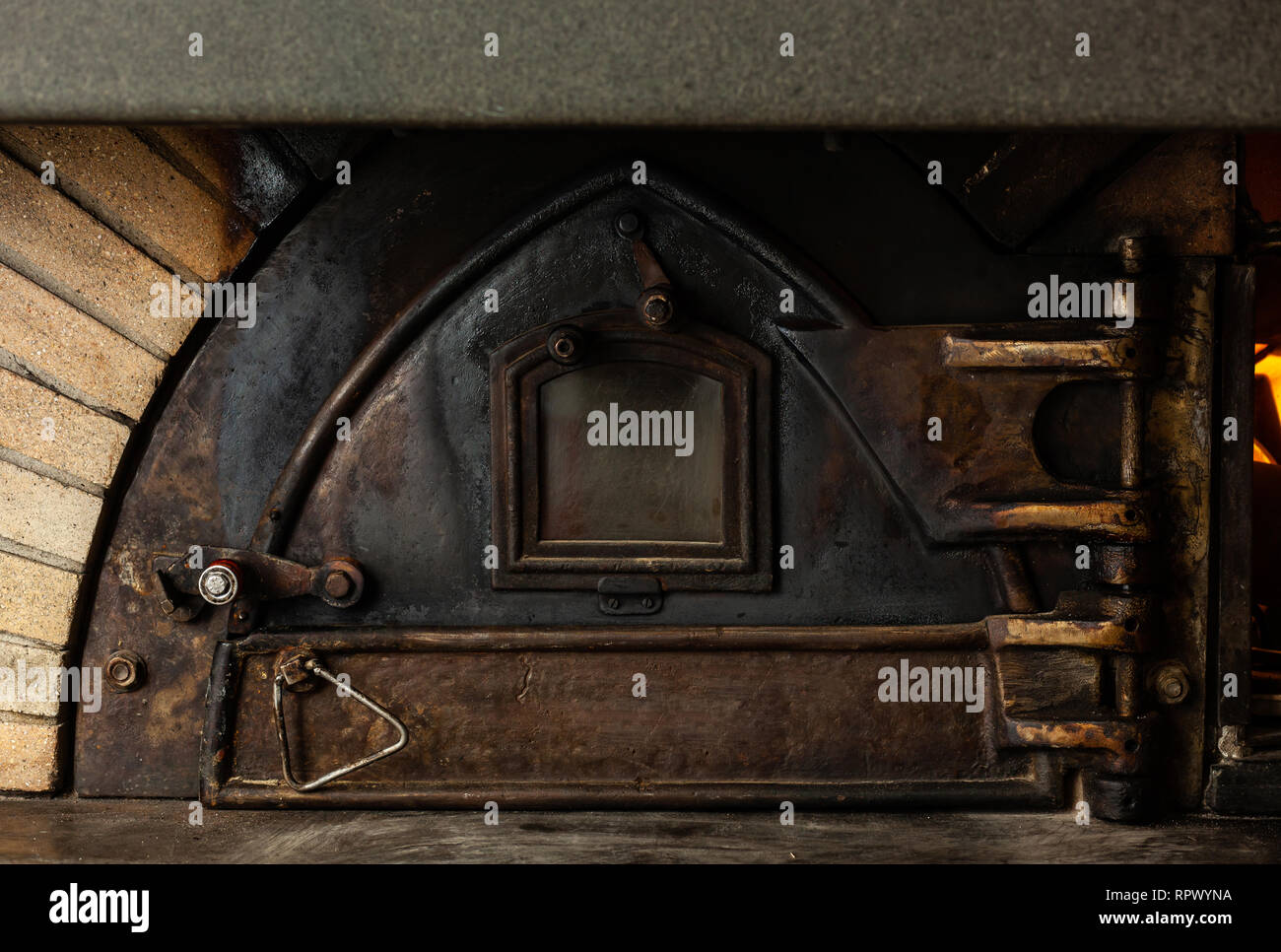 Antique wood oven with cast iron door Stock Photo - Alamy