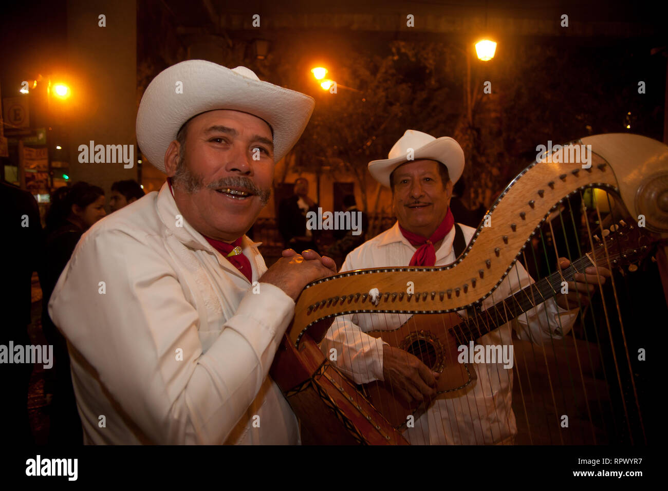 Mariachi musicians play mexican music at Garibaldi Square in Mexico ...