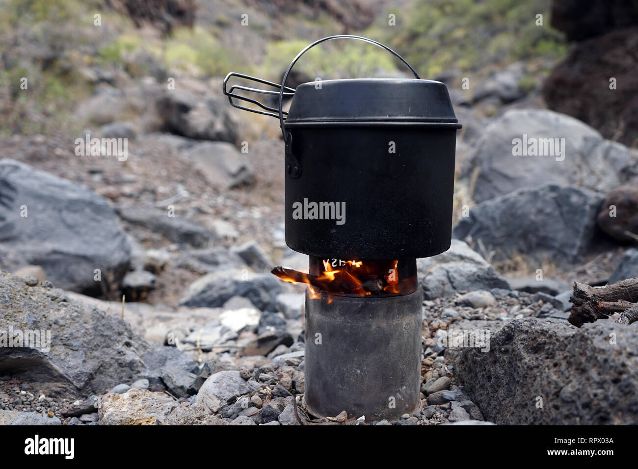 Tourist stove with kattle Stock Photo - Alamy