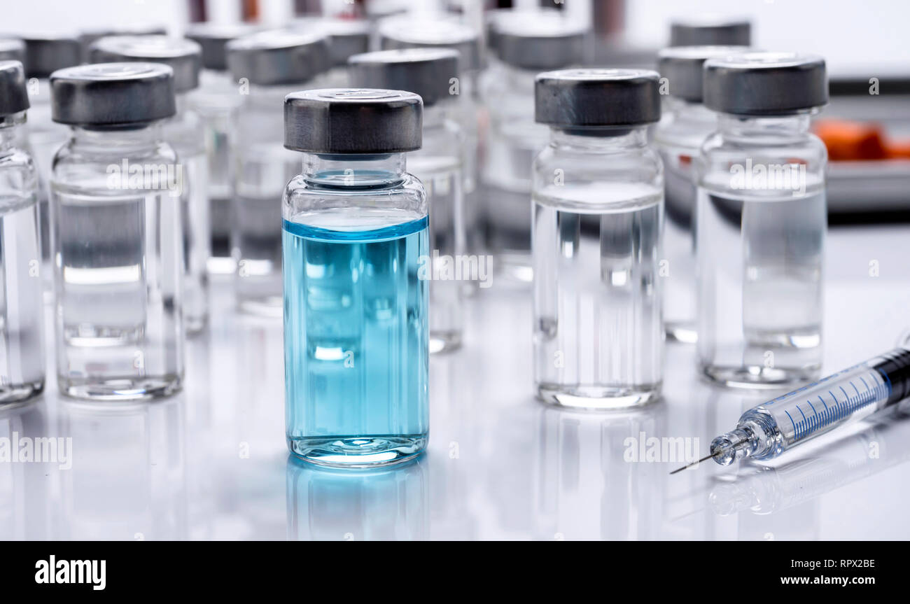 Several vials with medication, conceptual image Stock Photo - Alamy