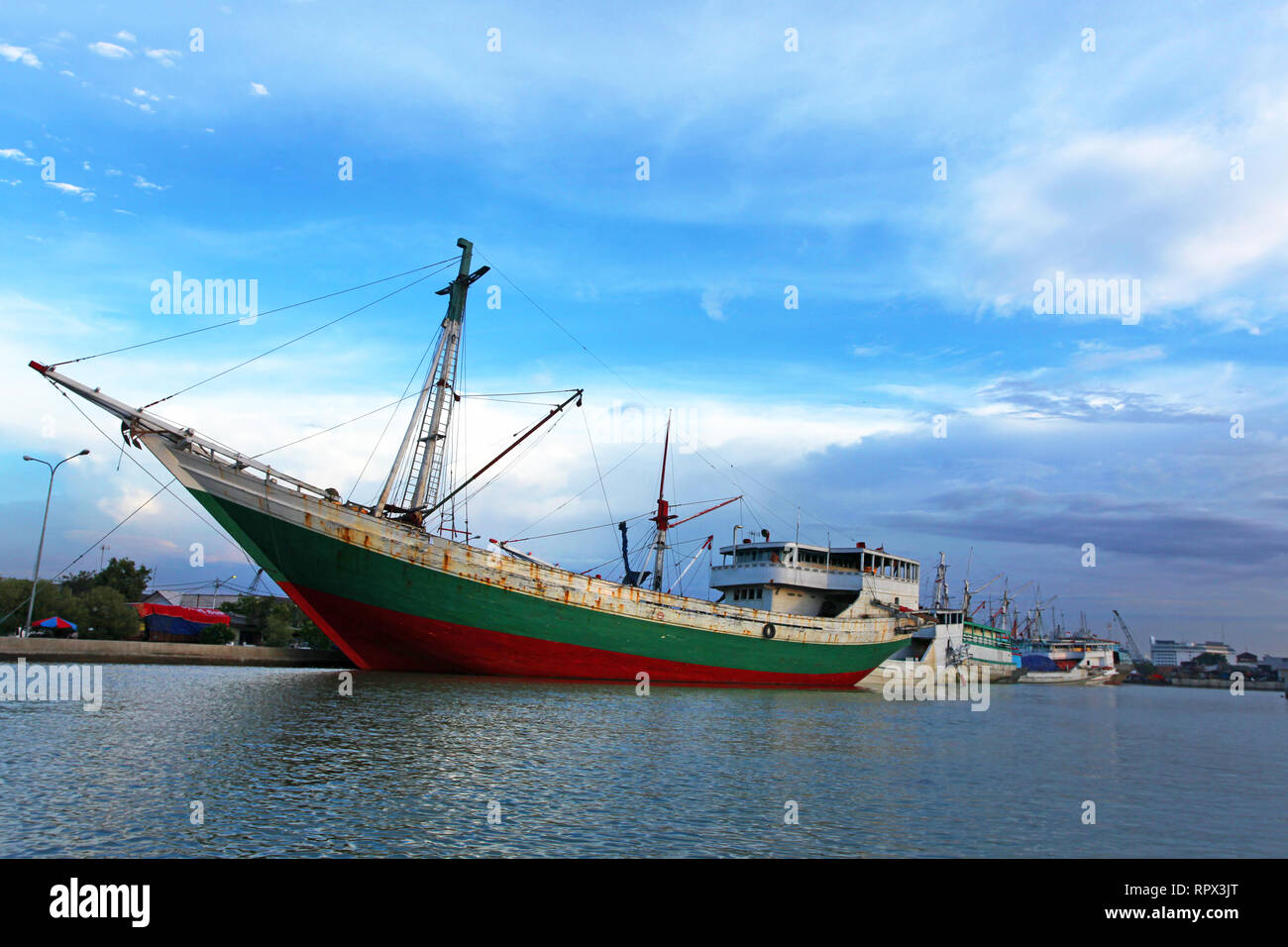 Boats moored in a harbor, Indonesia Stock Photo - Alamy