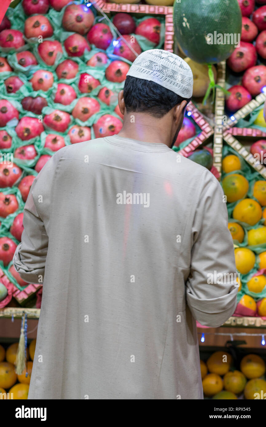 Unidentified Arabian man on the street sell local vegetable and fruits ...