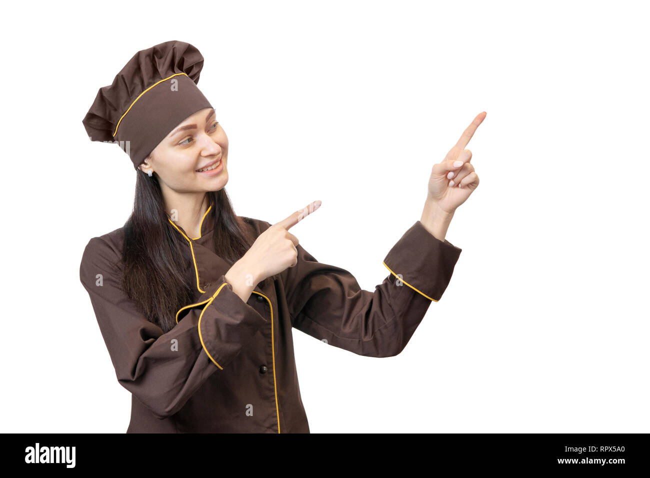 cheerful female chef pointing with both hands to one side, isolated on ...