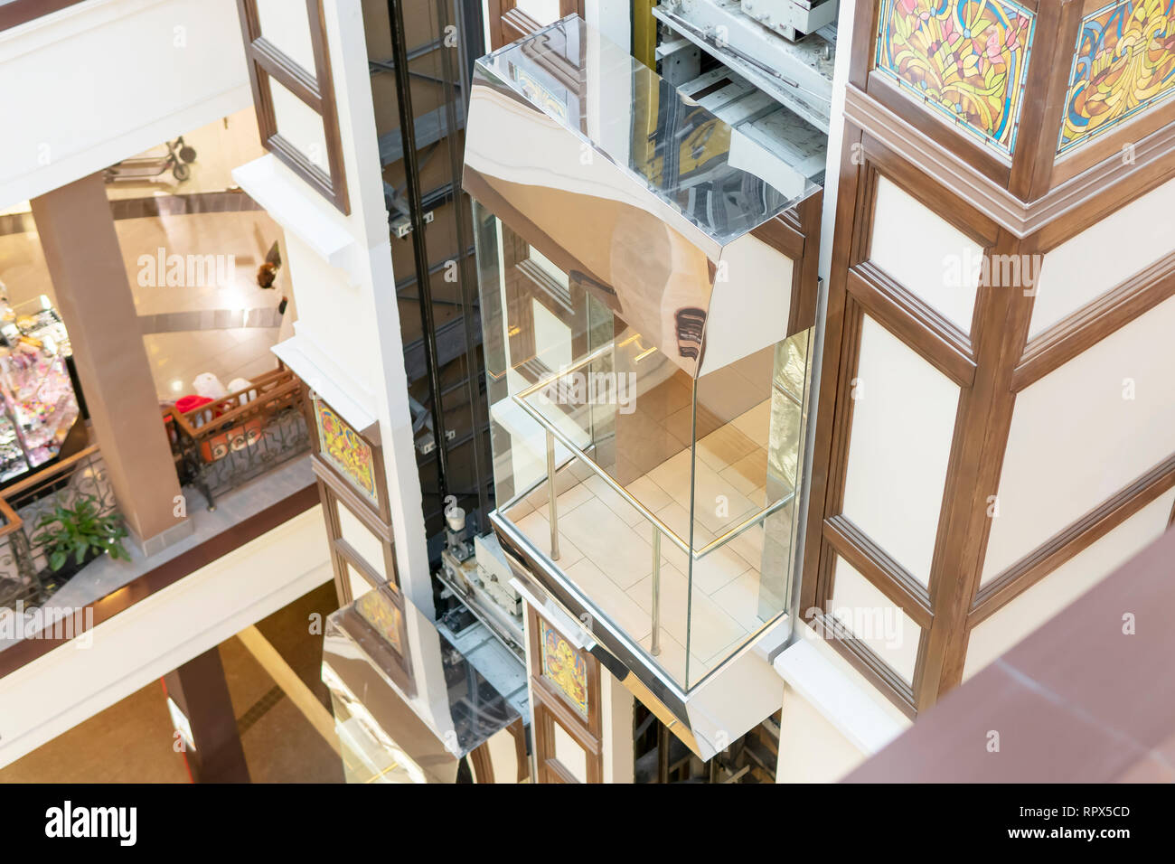 beautiful empty glass elevator in a big shopping center Stock Photo - Alamy
