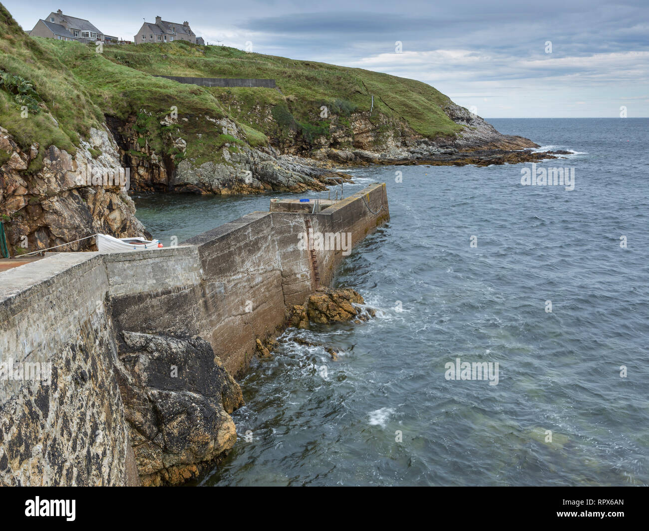 The harbour at Skigersta at the northern end of the Isle of Lewis ...