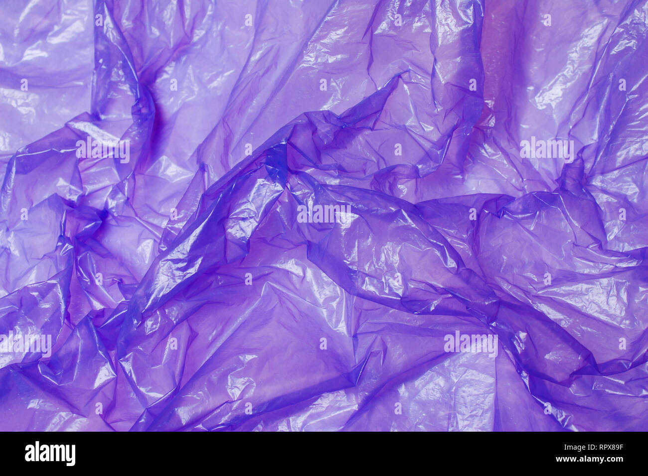 Purple plastic bag. The concept of using environmentally friendly ...