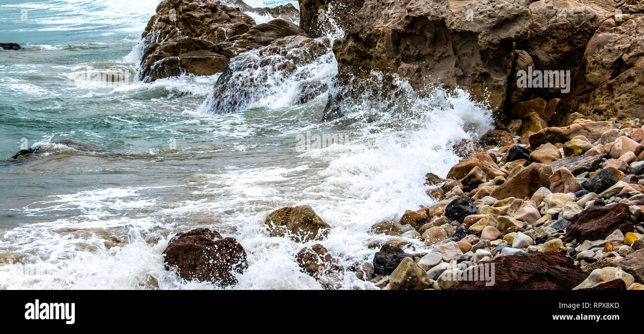Water against ocean rocks Stock Photo - Alamy