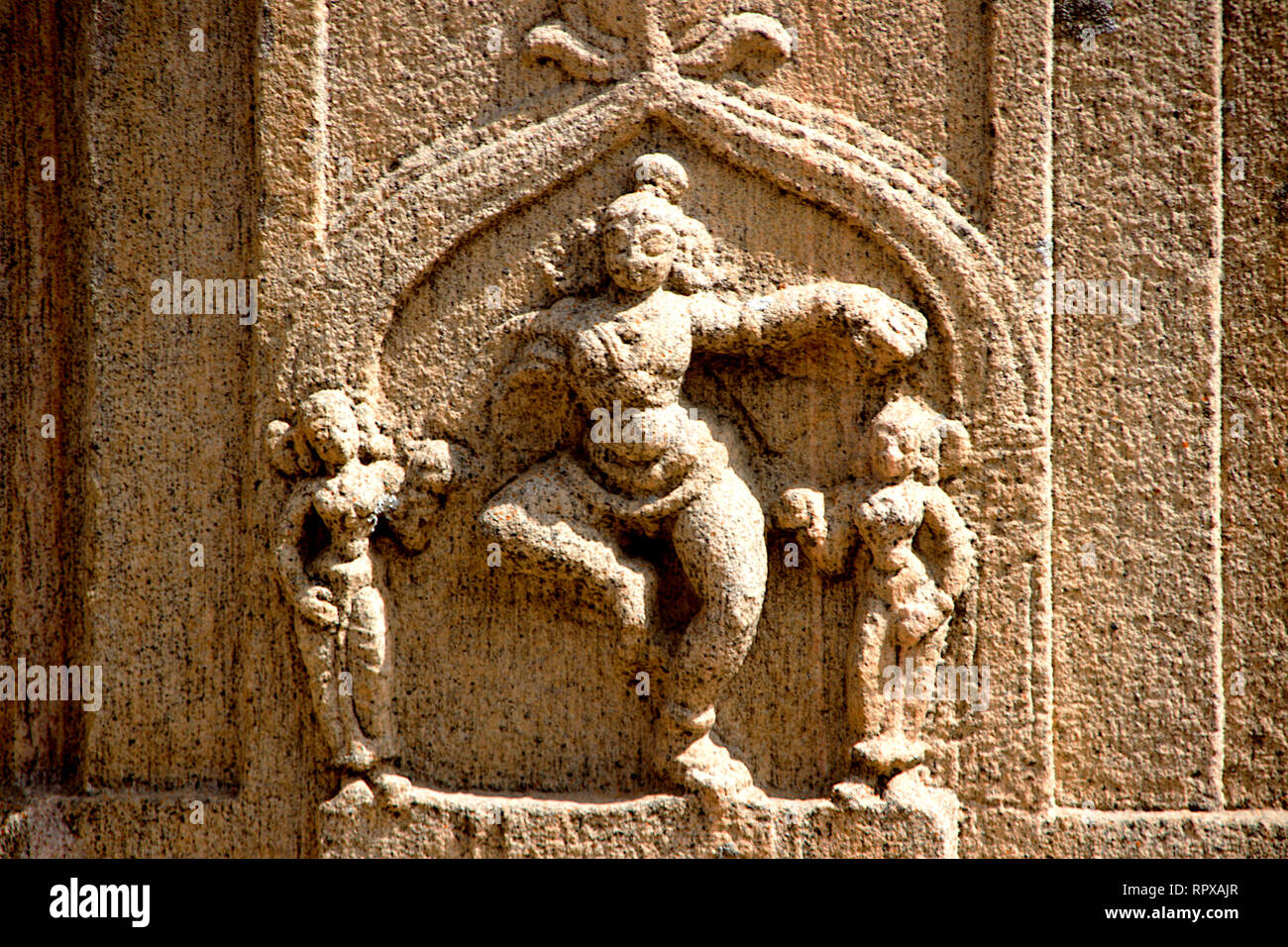 Bas-relief carving of gracious pose of dancing girl on stone pillar at ...