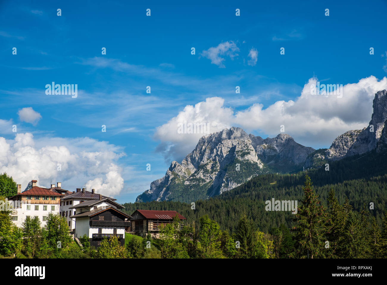 Along the streets of the ancient village of Sappada. Friuli Stock Photo ...