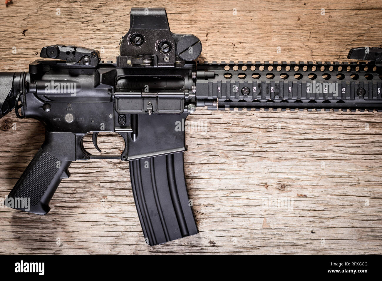 Assault rifle old wooden table hi-res stock photography and images - Alamy