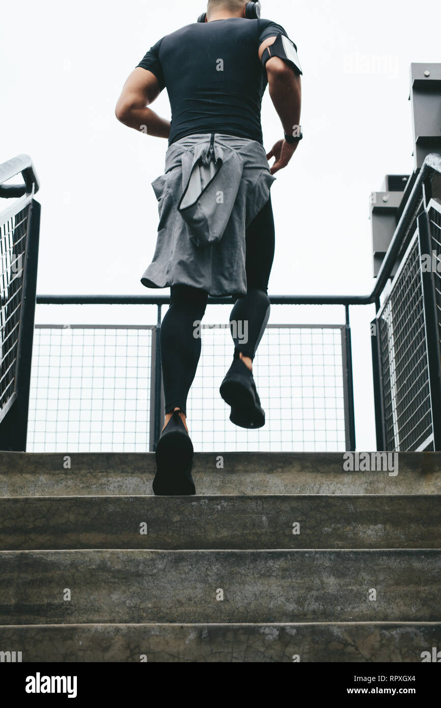 Man moving up stairs hi-res stock photography and images - Alamy