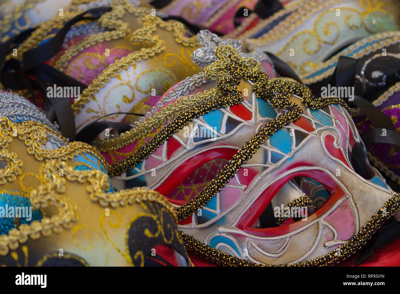 Carnival masks, on the street vendor's bench in Rome Stock Photo - Alamy