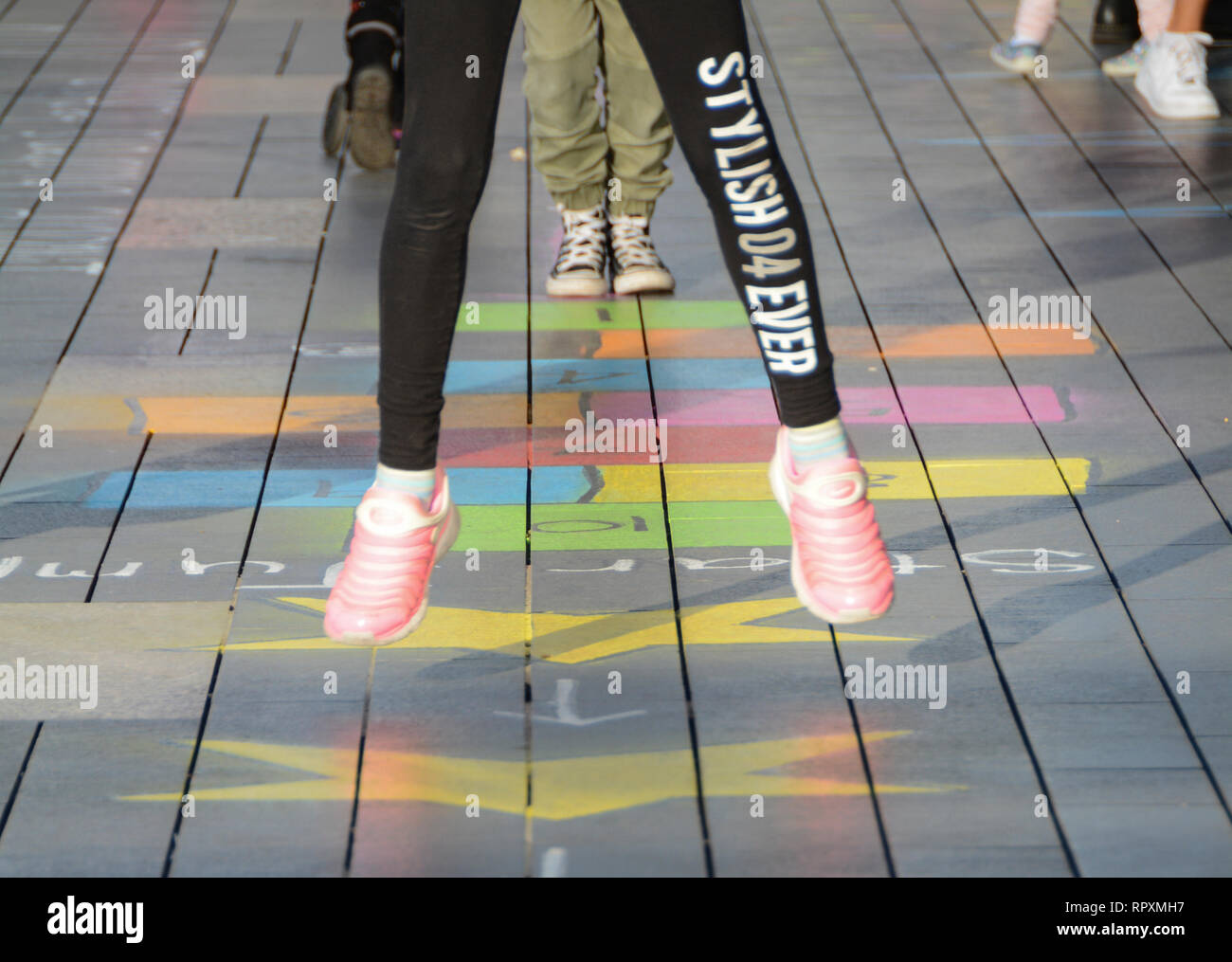 Children playing hopscotch hi-res stock photography and images - Alamy